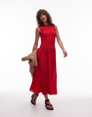 Mango - Midi jurk met gesmokt lijfje en verlaagde taille in rood | ASOS