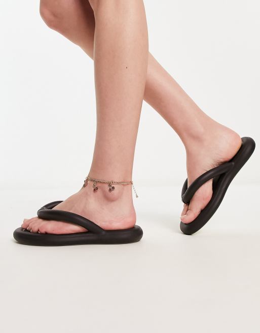 Melissa chunky bubble flip flops in black | ASOS