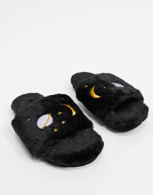 Monki Cozy recycled faux fur planet slippers in black | ASOS