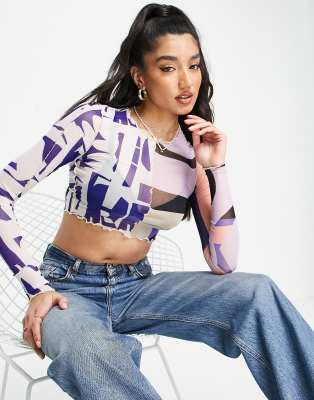 Monki - Crop top van mesh met lange mouwen en paarse grafische print | ASOS