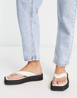 Monki faux leather thong sandals in black and white | ASOS