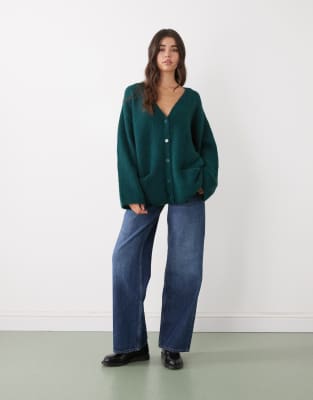 Monki - Gebreid oversized vest in bosgroen | ASOS
