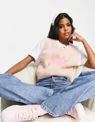 Monki - Gebreide spencer met bloemenprint in roze | ASOS