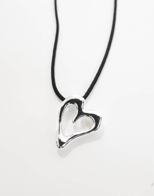 Monki heart pendant necklace in black | ASOS