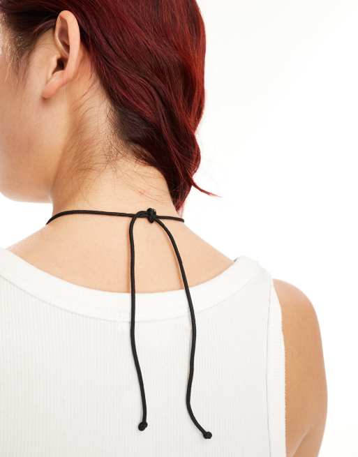 Monki heart pendant necklace in black | ASOS