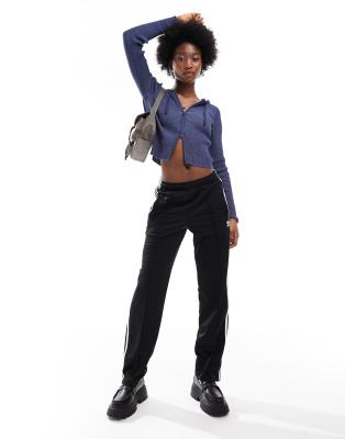 Monki – Langärmlige, gerippte Strickjacke in zweifarbigem Blau mit doppeltem Reißverschluss | ASOS