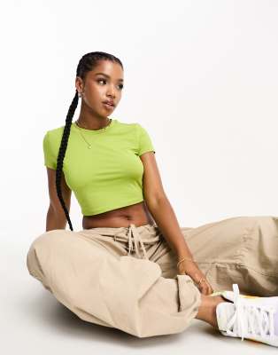 Monki shrunken baby crop top in bright green | ASOS
