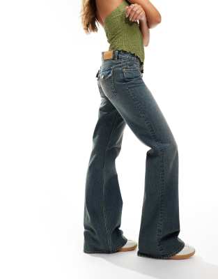 Monki - Trudy - Jean évasé taille basse - Bleu foncé canyon | ASOS