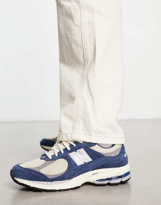 New Balance 2002 trainers in blue and off white | ASOS