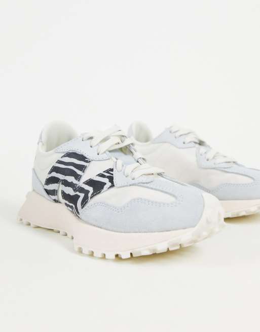 New Balance 327 sneakers in pastel blue and zebra | ASOS