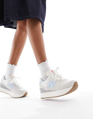 New Balance 574 sneakers in white with light blue detail | ASOS
