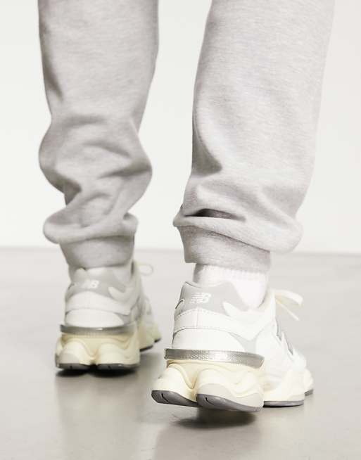 New Balance 9060 sneakers in white with gray metallic detail New Balance 9060 sneakers in white with gray metallic detail
