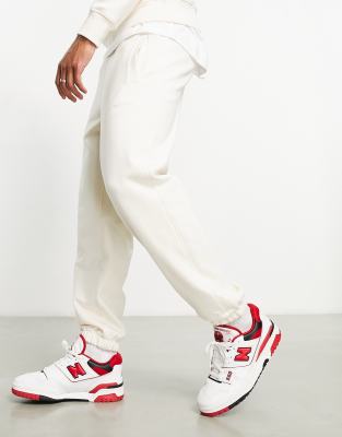 New Balance - Athletics State - Pantaloni della tuta bianco sporco | ASOS
