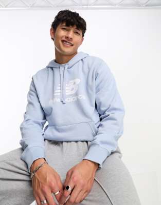 New Balance Essentials Stacked Logo Fleece Hoodie in light blue | ASOS