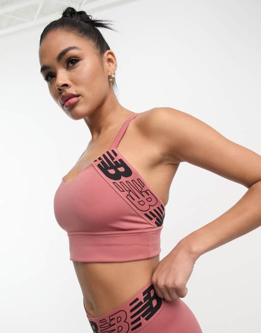 New Balance Running Relentless medium support sports bra in dusky pink | ASOS