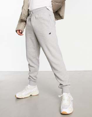 New Balance small logo joggers in grey | ASOS