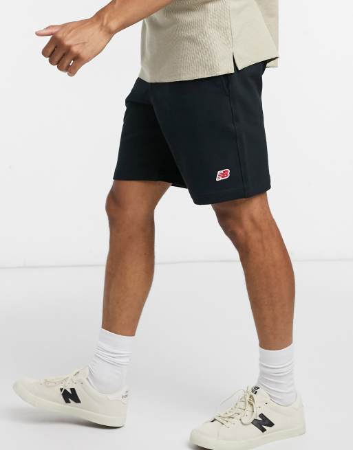 New Balance small logo shorts in black | ASOS