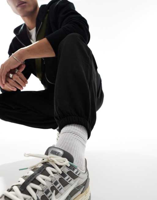 New Look cargo trackies in black | ASOS