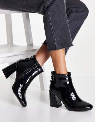 New Look patent boots with flared heel in black | ASOS