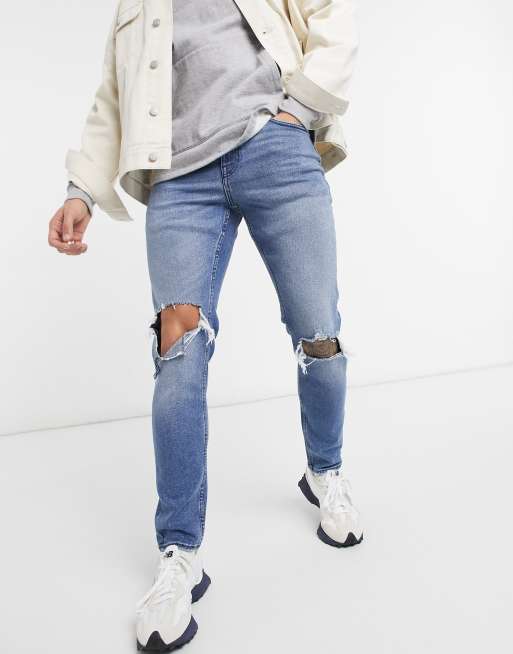 New Look skinny jeans with knee rips in mid blue | ASOS