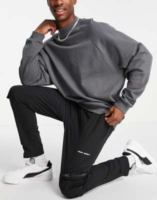 Night Addict Cargo Pants In Black | ModeSens