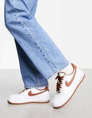 Nike Air Force 1 '07 sneakers in white and brown | ASOS
