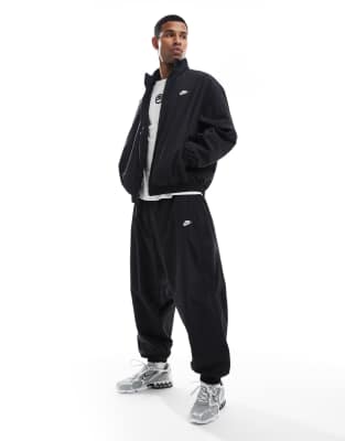 Nike - Club - Pantalon de survêtement oversize - Noir | ASOS