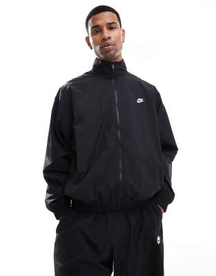 Nike Club woven oversized track jacket in black | ASOS