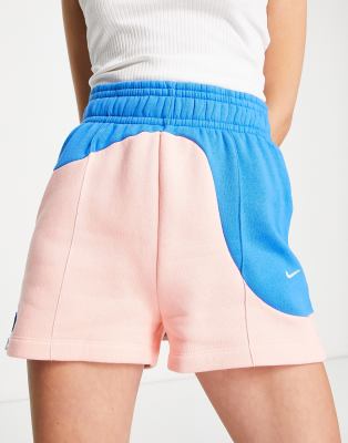 Nike Color Clash color block fleece shorts in pink | ASOS