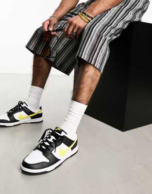 Nike – Dunk Low Retro – Czarno-żółte buty sportowe przed kostkę | ASOS
