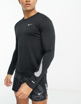 Nike Running Dri-FIT long sleeve top in black | ASOS
