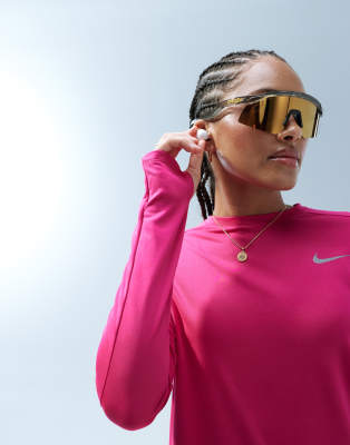 Nike Running Pacer Dri-Fit long sleeve top in fierce pink | ASOS