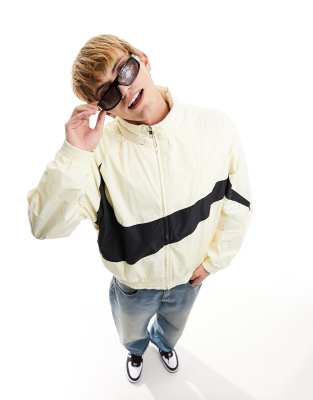 Nike Swoosh unisex woven jacket in cream | ASOS