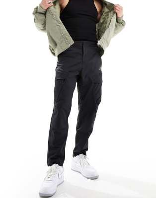 Nike Tech Essentials Cargo Pants In Black | ModeSens
