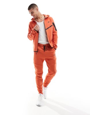 Nike Tech Fleece Cuffed Sweatpants In Orange | ModeSens