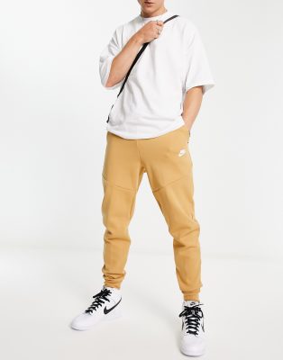 Nike Tech Fleece jogger in elemental gold | ASOS