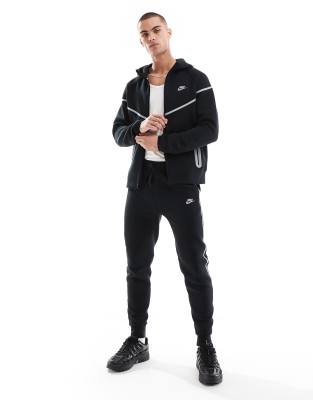 Nike Tech Fleece reflective joggers in black | ASOS