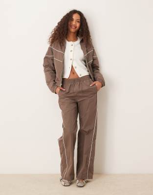 Nike Windrunner track jacket and track pants in brown | ASOS