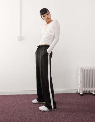 Noisy May wide leg trackies with side stripe in black | ASOS