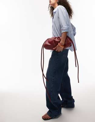 OLEND dumpling elongated shoulder bag in cherry red | ASOS