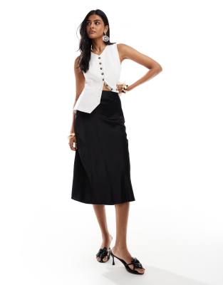 & Other Stories - Jupe nuisette mi-longue en tissu satiné - Noir | ASOS