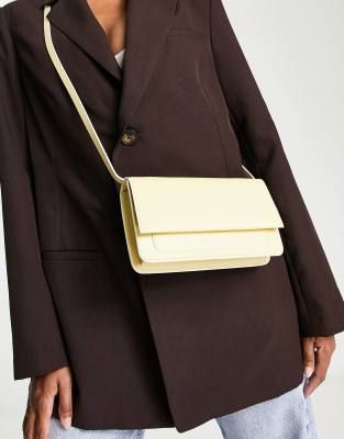 & Other Stories leather fold over cross body bag in yellow | ASOS