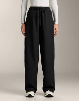 OYSHO 10k waterproof straight-leg trousers in black | ASOS