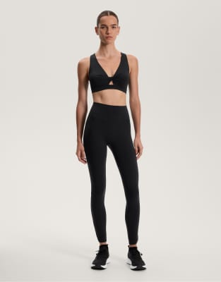 OYSHO Comfortlux high rise knot 65cm ankle-length leggings in black Free Shipping | Clothing