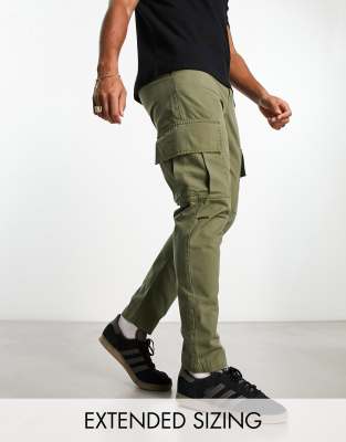 Pantalones cargo caquis tapered de tejido antidesgarros de ASOS DESIGN ...