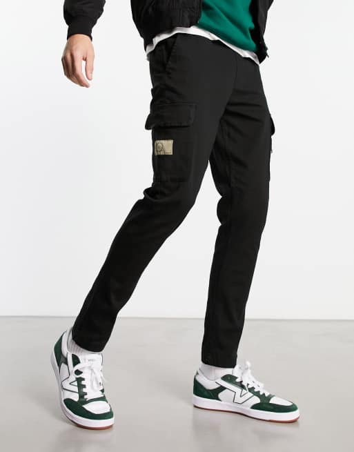 Pantalones negros cargo de corte pitillo con cordón ajustable en la cintura de Jack & Jones ...