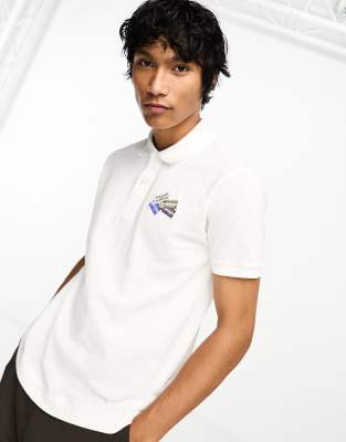 Polo blanco con logo en el pecho de Lacoste | ASOS