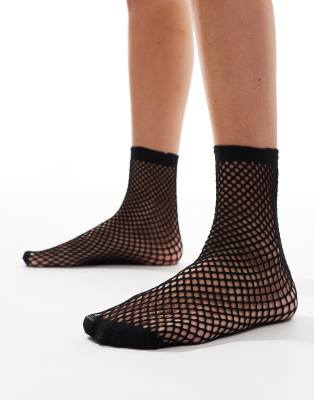 Pretty Polly fishnet anklet socks in black | ASOS