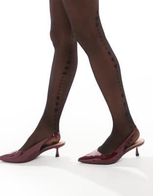 Pretty Polly mini heart placement detail tights in black | ASOS