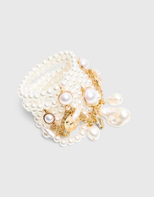 Public Desire Layered pearl bracelet with gold charms in pearl | ASOS